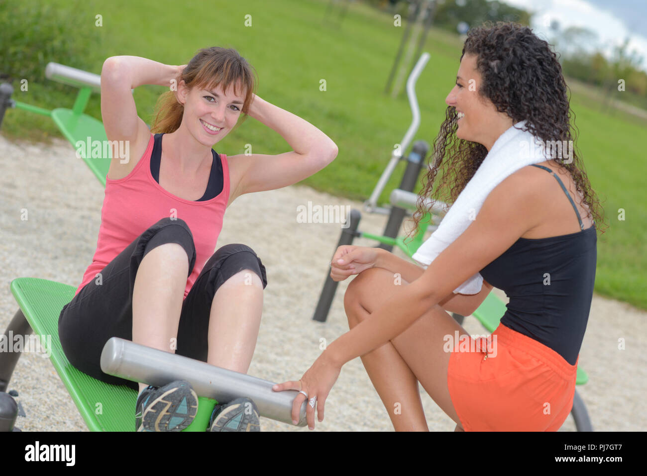 Woman working out in park hi-res stock photography and images - Alamy