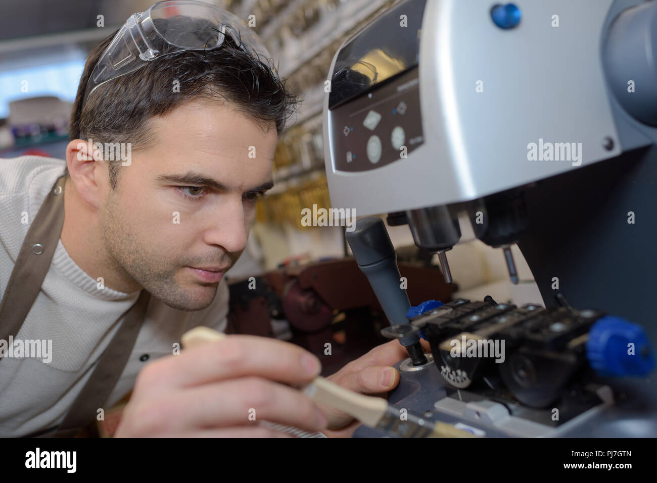 fixing a machine Stock Photo - Alamy