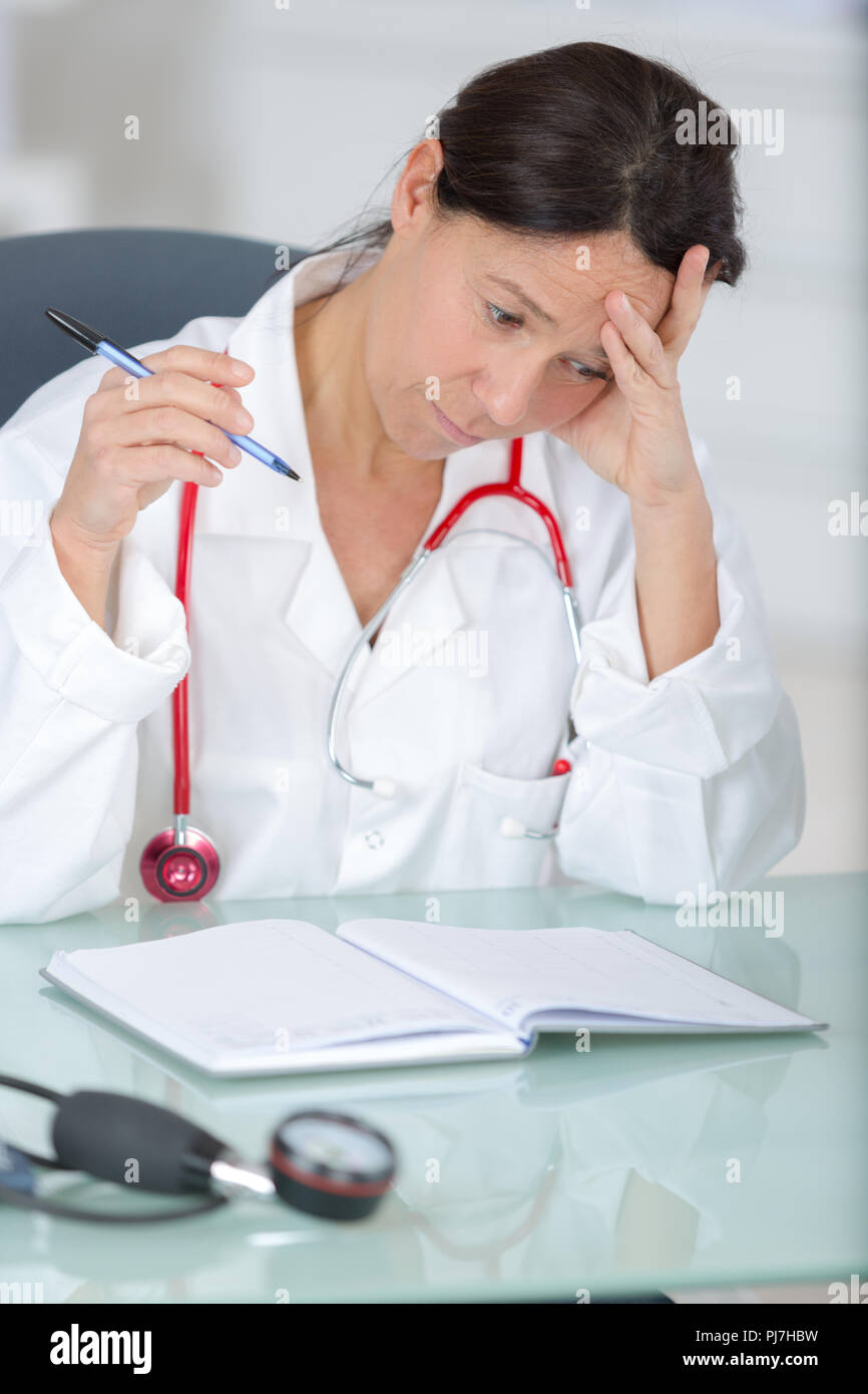 thinking medical doctor Stock Photo - Alamy