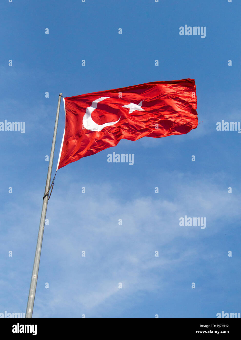Turkish national flag hang on a pole in open air Stock Photo - Alamy