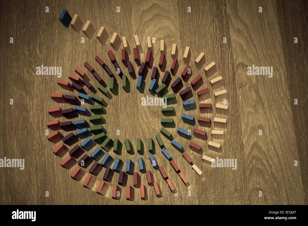 Colorful Domino Blocks in a line on a white background Stock Photo - Alamy