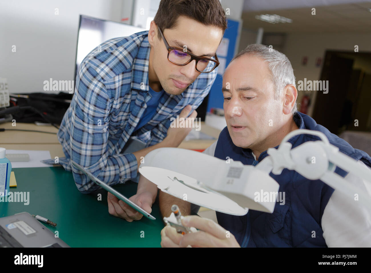 electronic student in class Stock Photo - Alamy