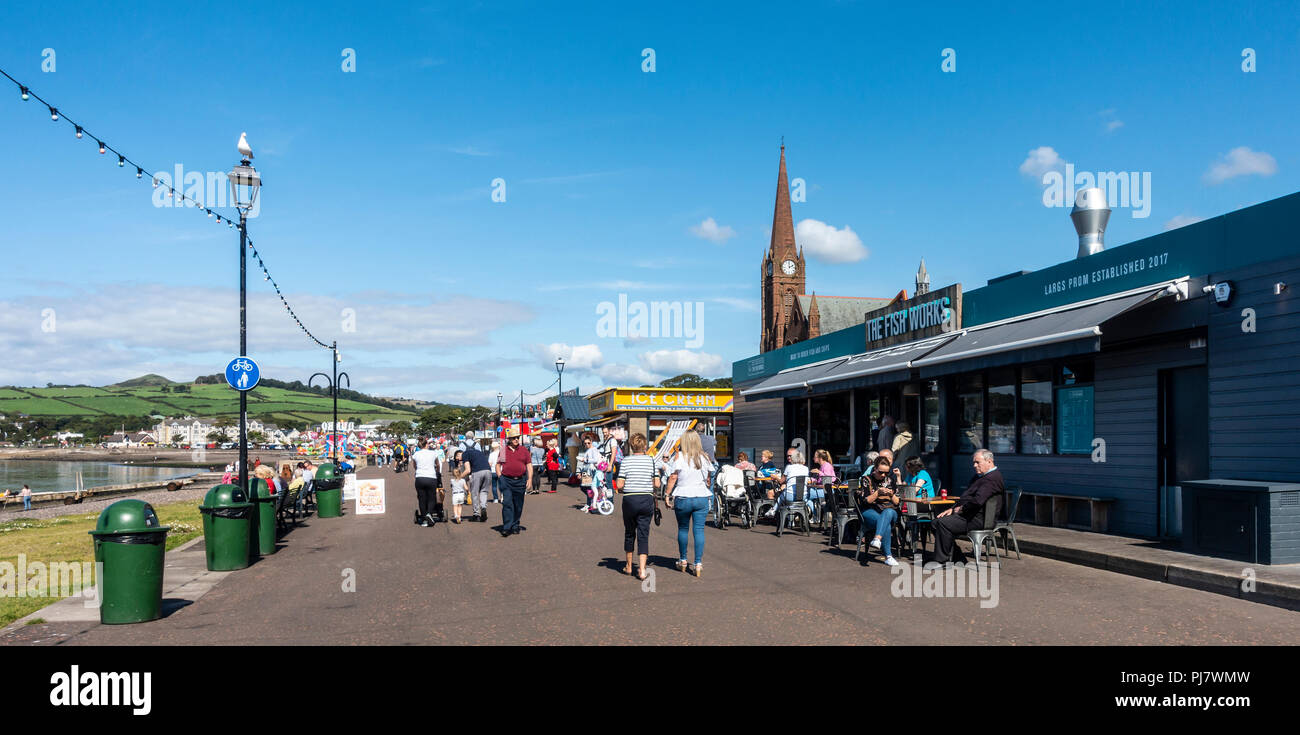 Largs promenade on a warm, sunny early September day. Fish and chips ...