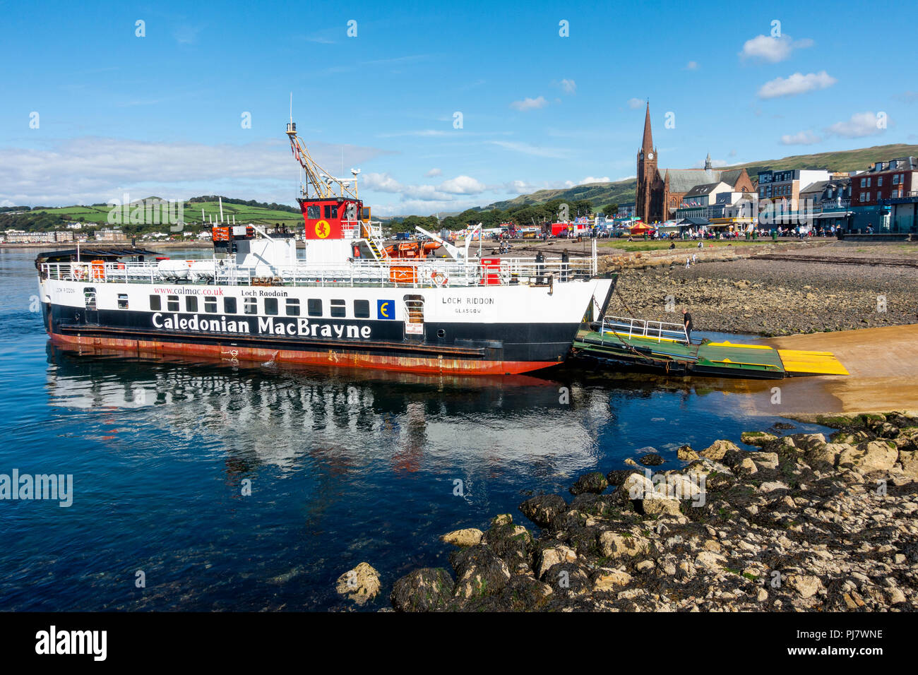 The Loch Riddon ro-ro / drive-through ferry with its ramp down and a ...