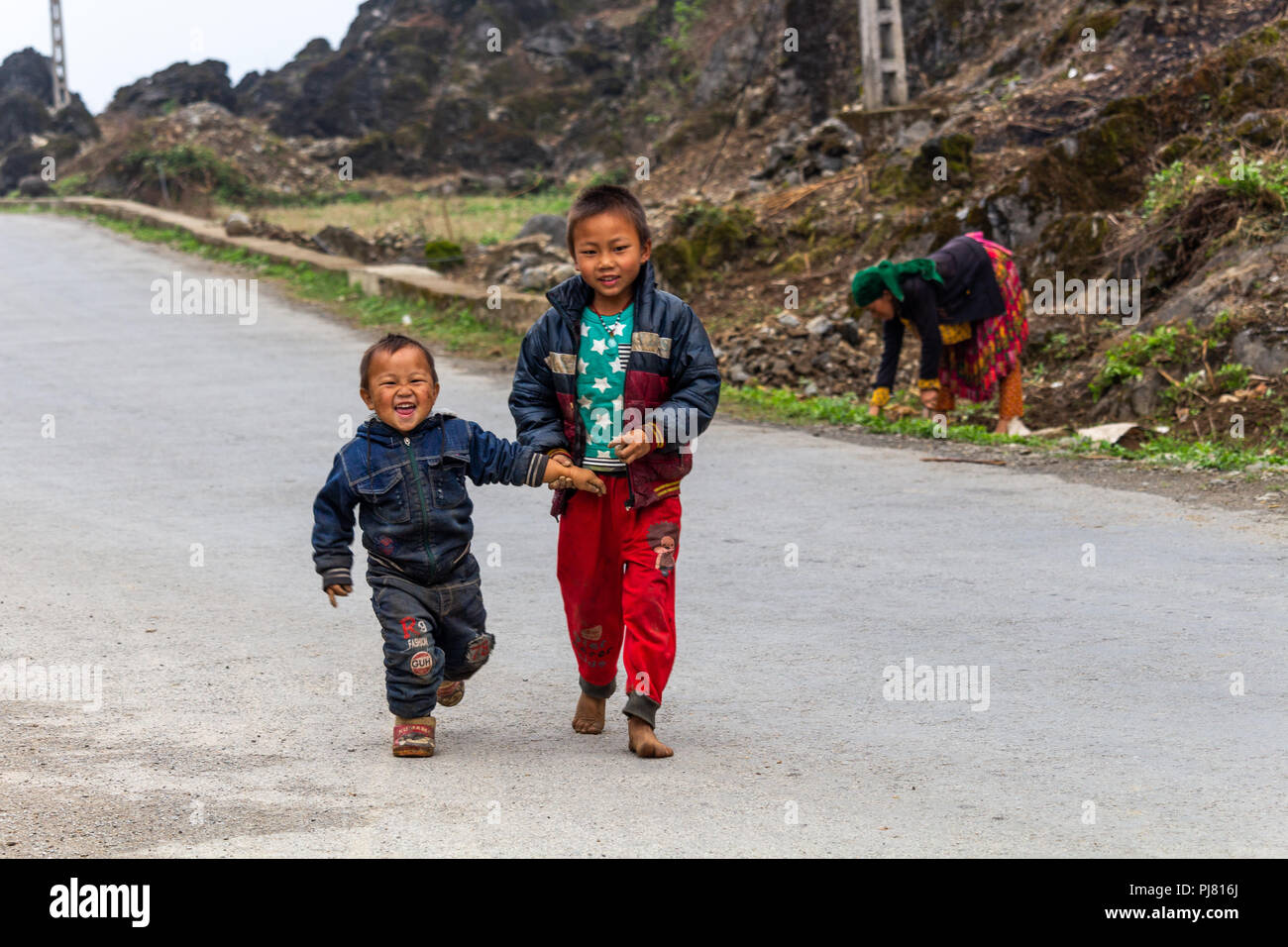 Poor rural children playing road hi-res stock photography and images ...
