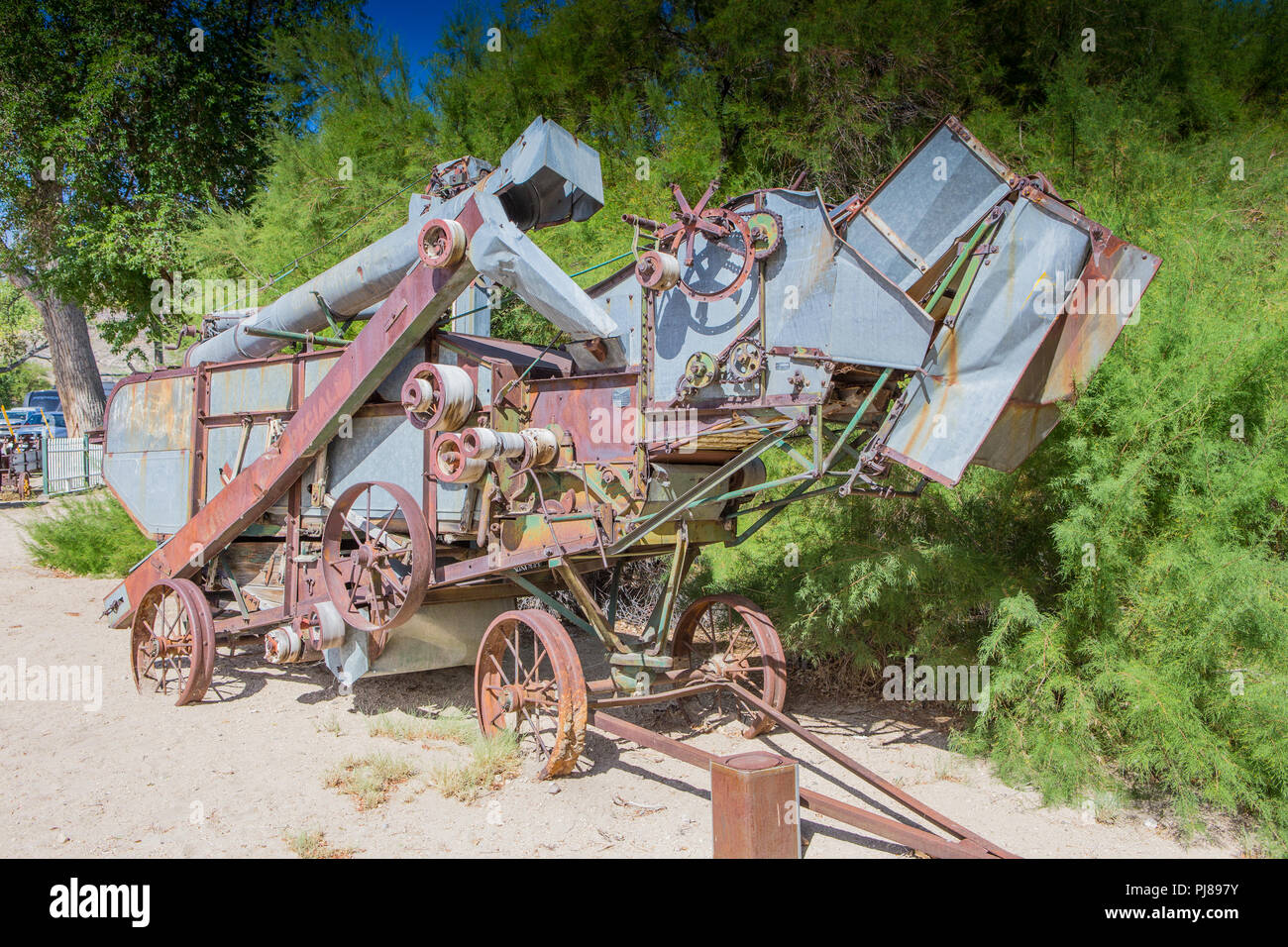 Old Red river special threshing machine on the roadside of highway 120 ...