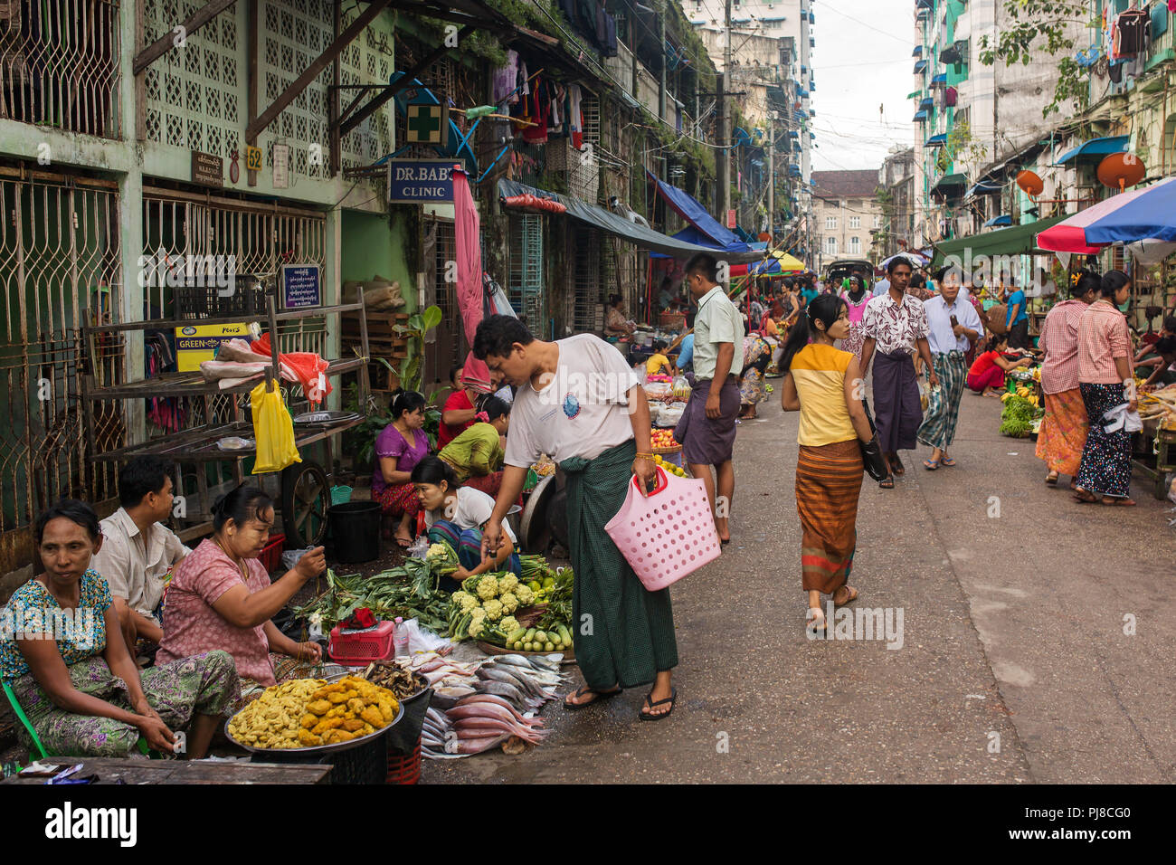 Yangon, Myanmar - September 27, 2016: Traditional burmese street market ...