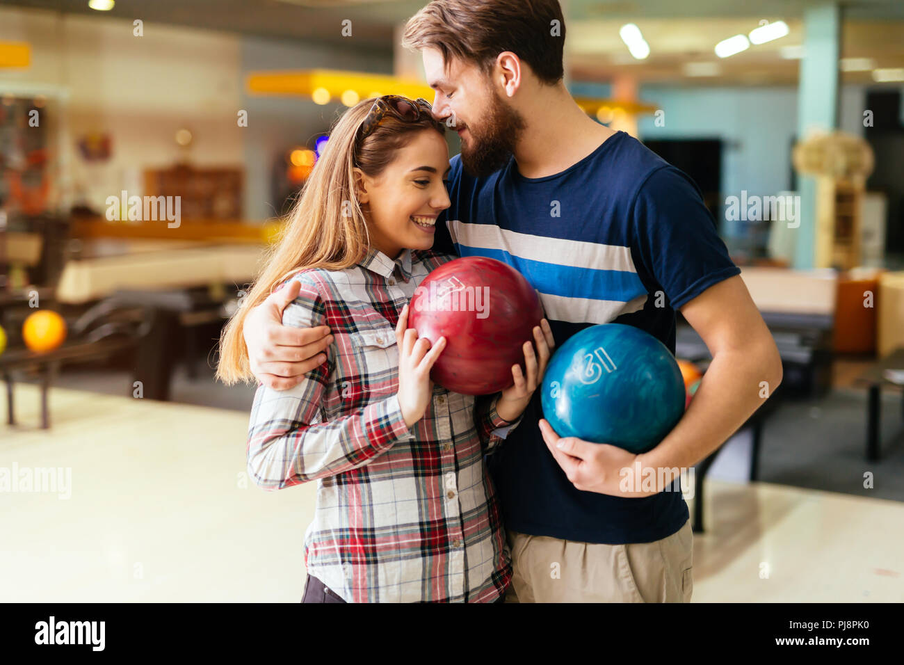 Beautiful couple dating and bowling Stock Photo - Alamy