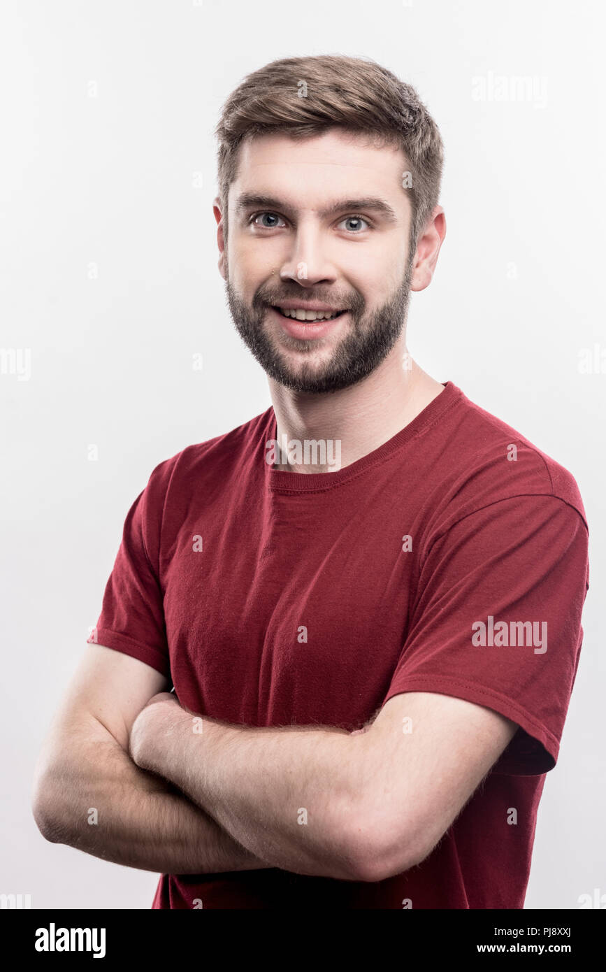 Bearded blue-eyed handsome man feeling excited and cheerful Stock Photo ...