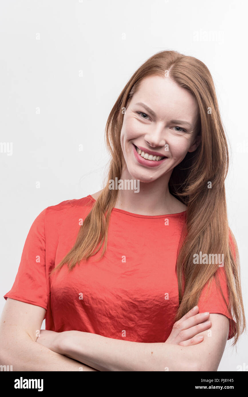 Pleasant good-looking businesswoman feeling successful after work Stock ...
