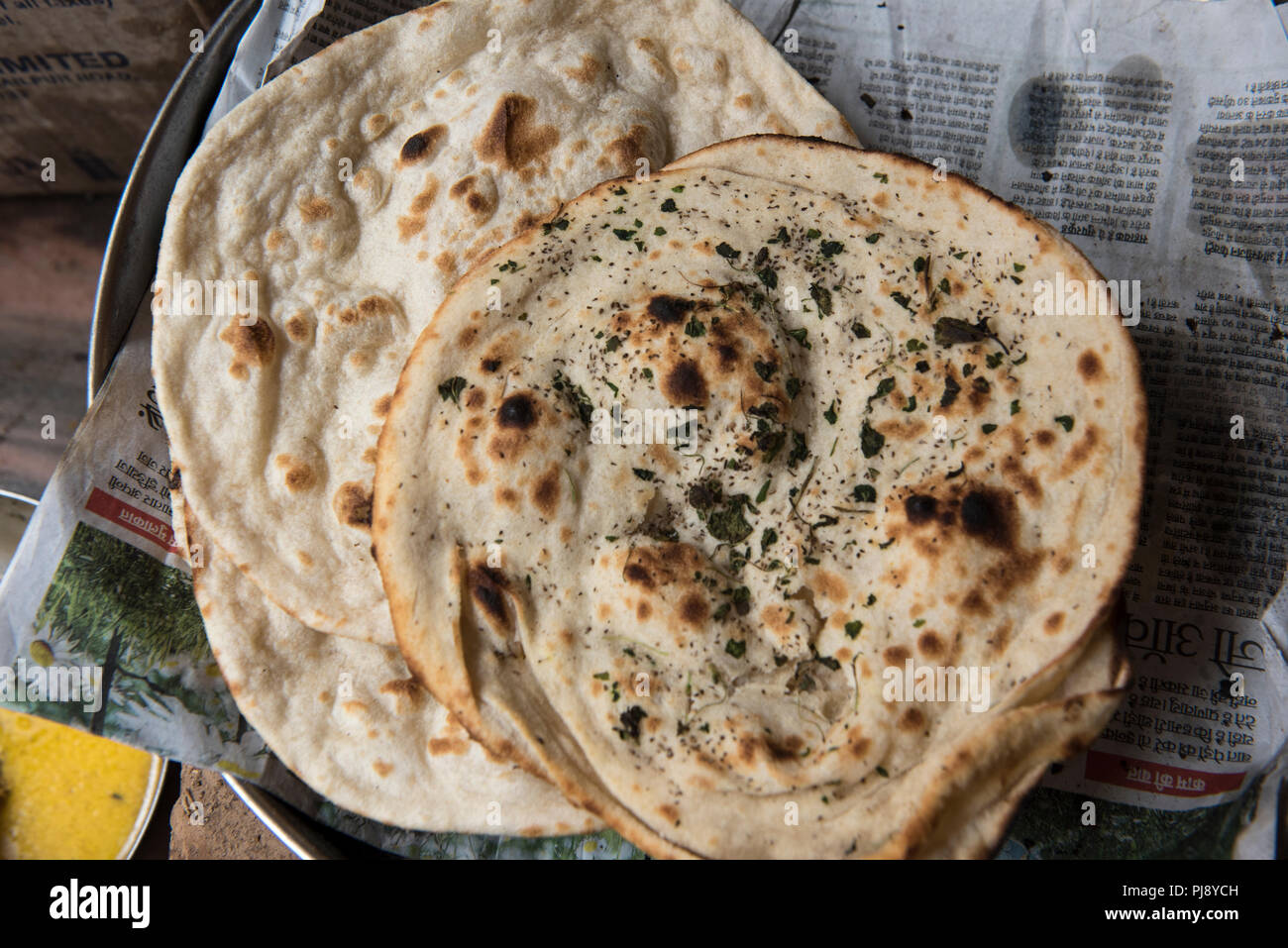 Tandoori roti hi-res stock photography and images - Alamy