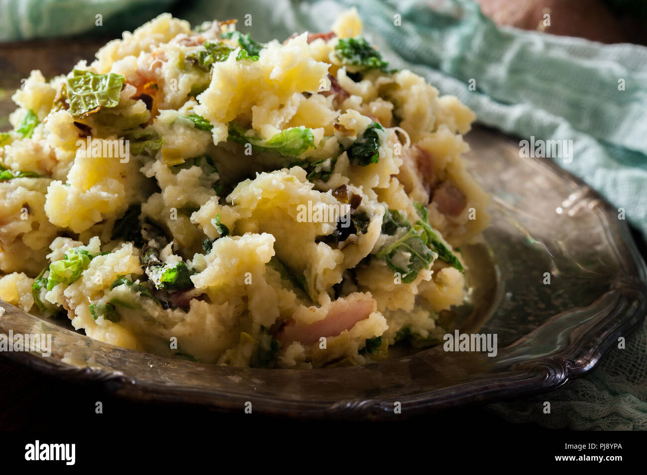 Colcannon, traditional Irish dish with mashed potatoes, bacon and ...