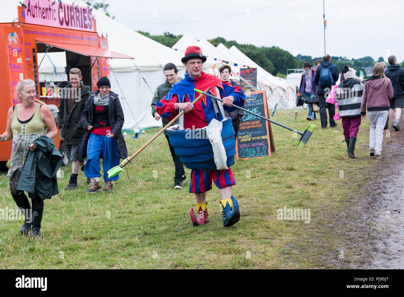 Chepstow, Wales – Aug 15: A colourful clown in a silly walking boat ...