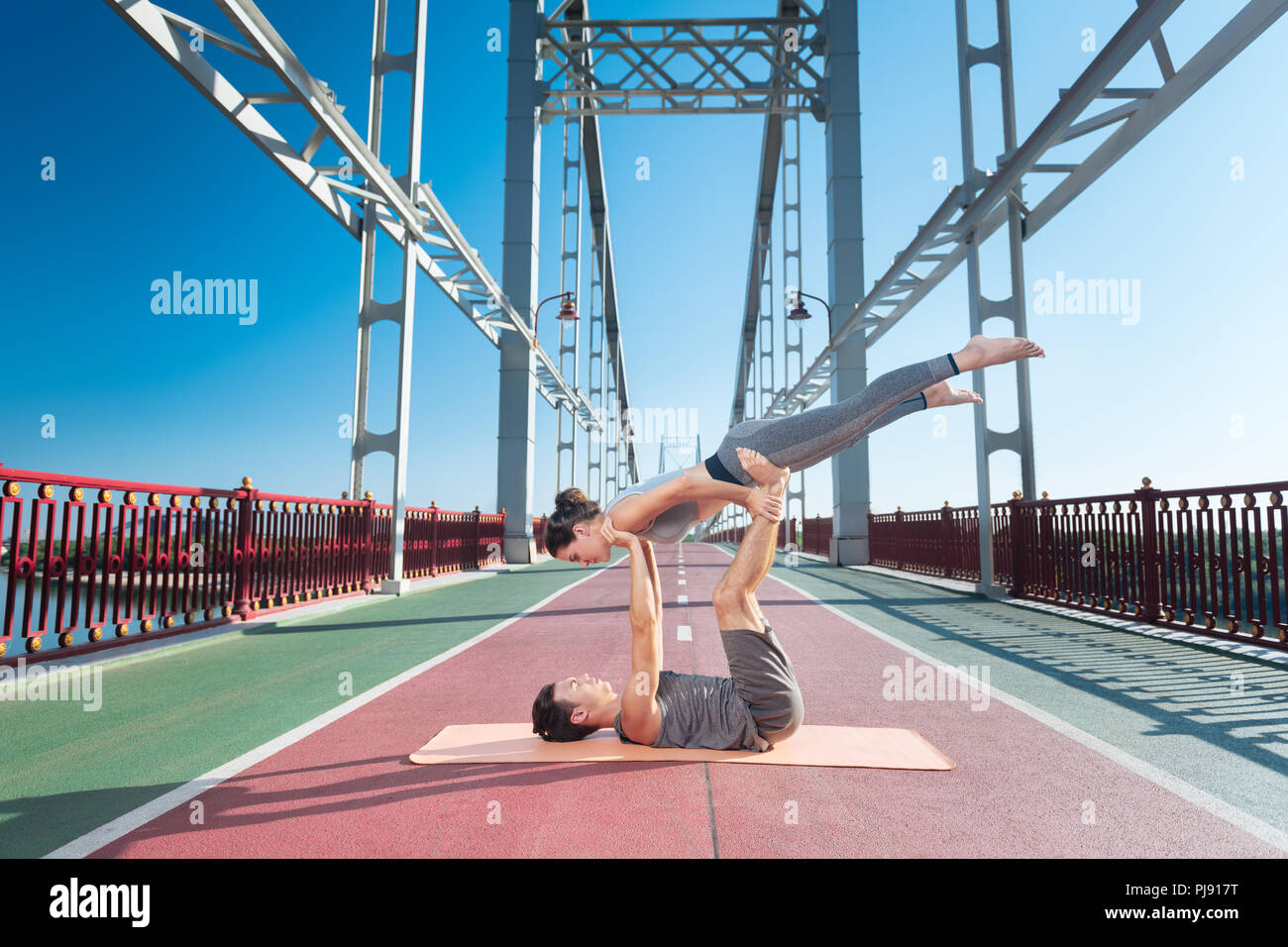 Trying yoga hi-res stock photography and images - Alamy
