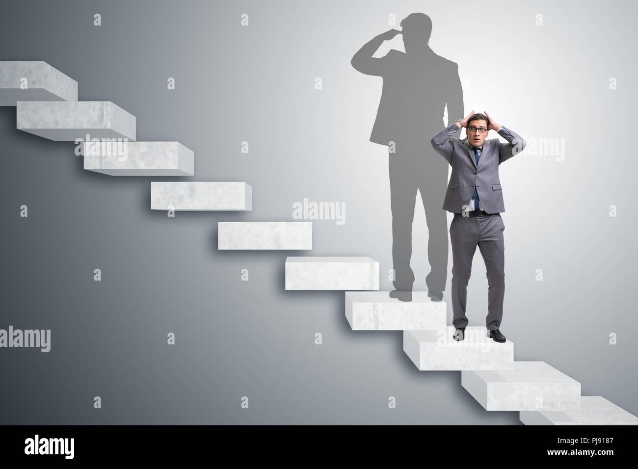 Businessman and his shadow in business concept Stock Photo - Alamy
