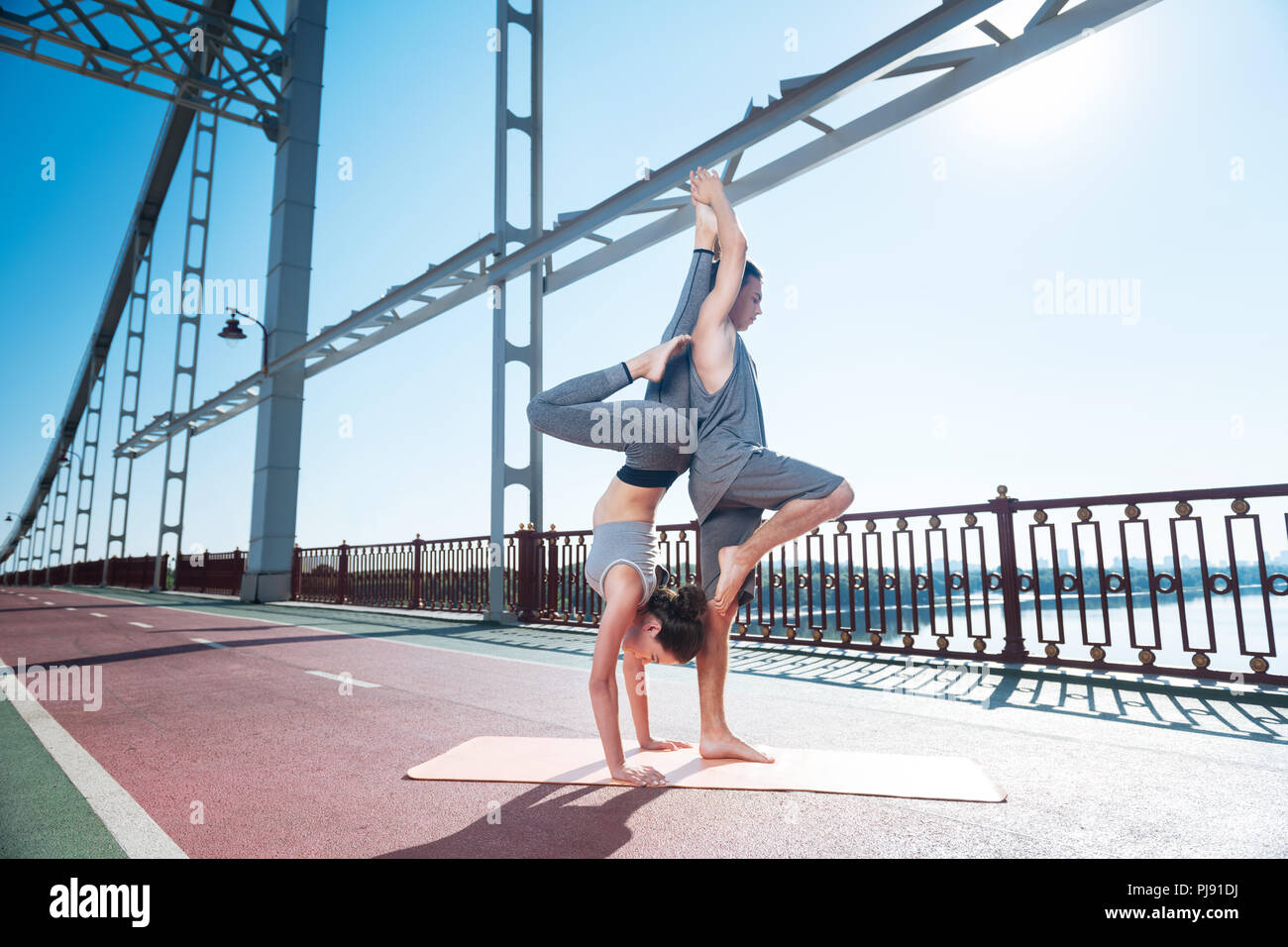 Vigorous man and woman discovering their limitations Stock Photo - Alamy