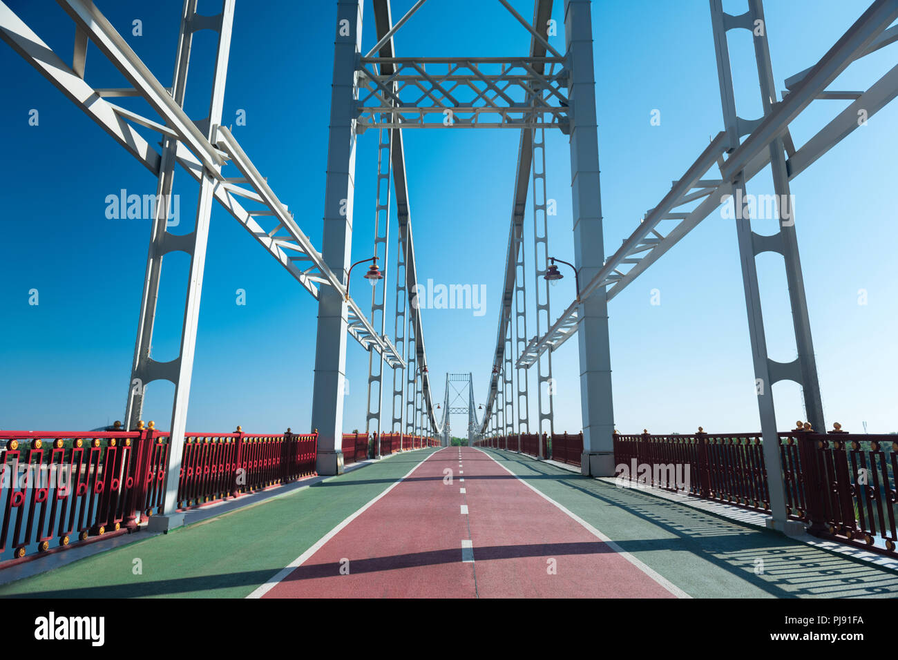 Classic modern bridge joining two river banks Stock Photo - Alamy