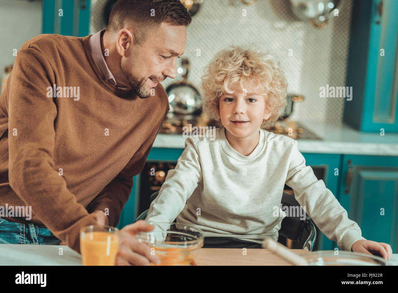 Small kid smiling and looking at you Stock Photo - Alamy