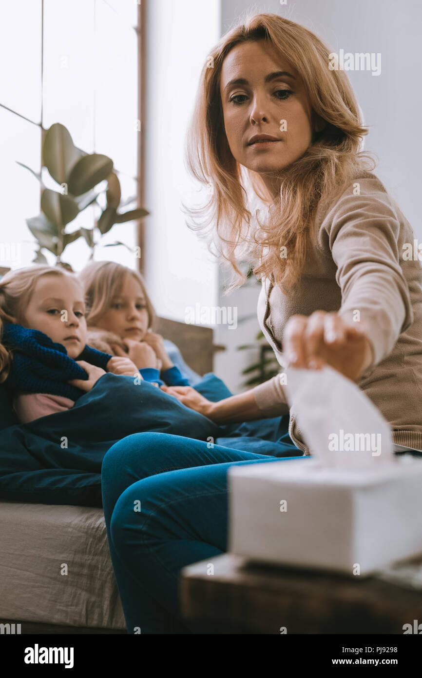 Taking tissue paper hi-res stock photography and images - Alamy