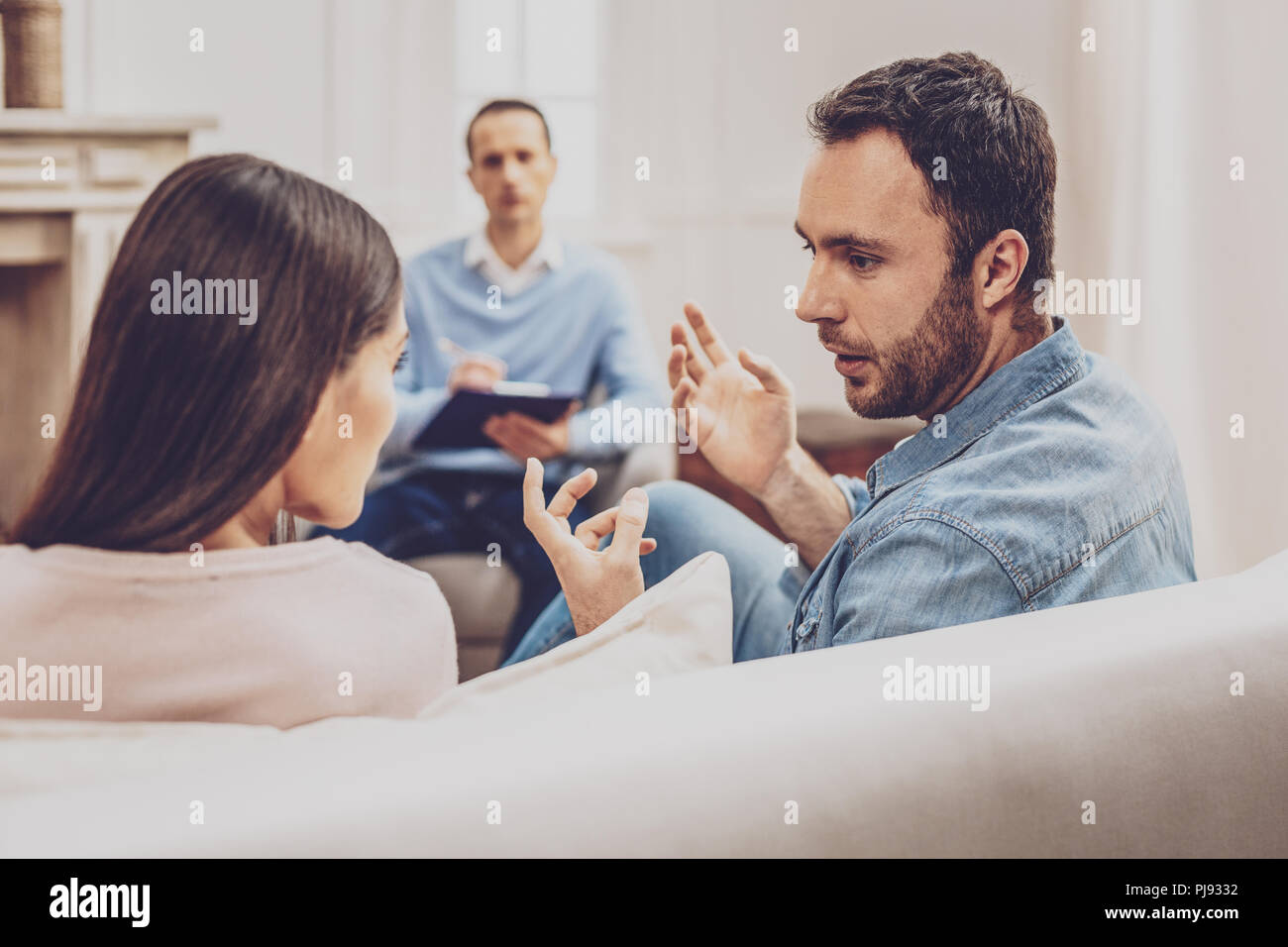 Man arguing with his wife hi-res stock photography and images - Alamy