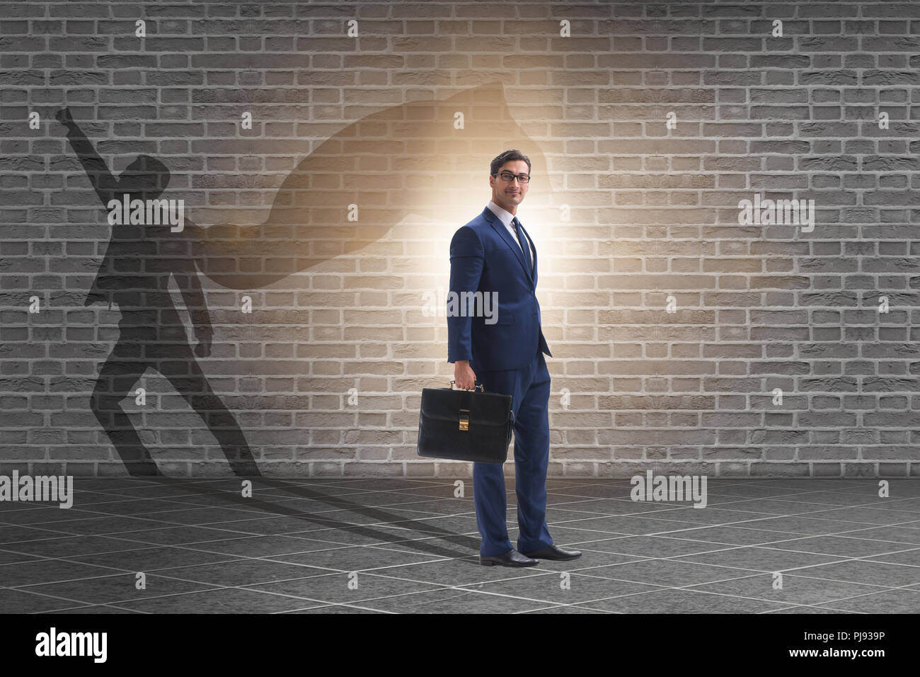 Businessman and his shadow in business concept Stock Photo - Alamy