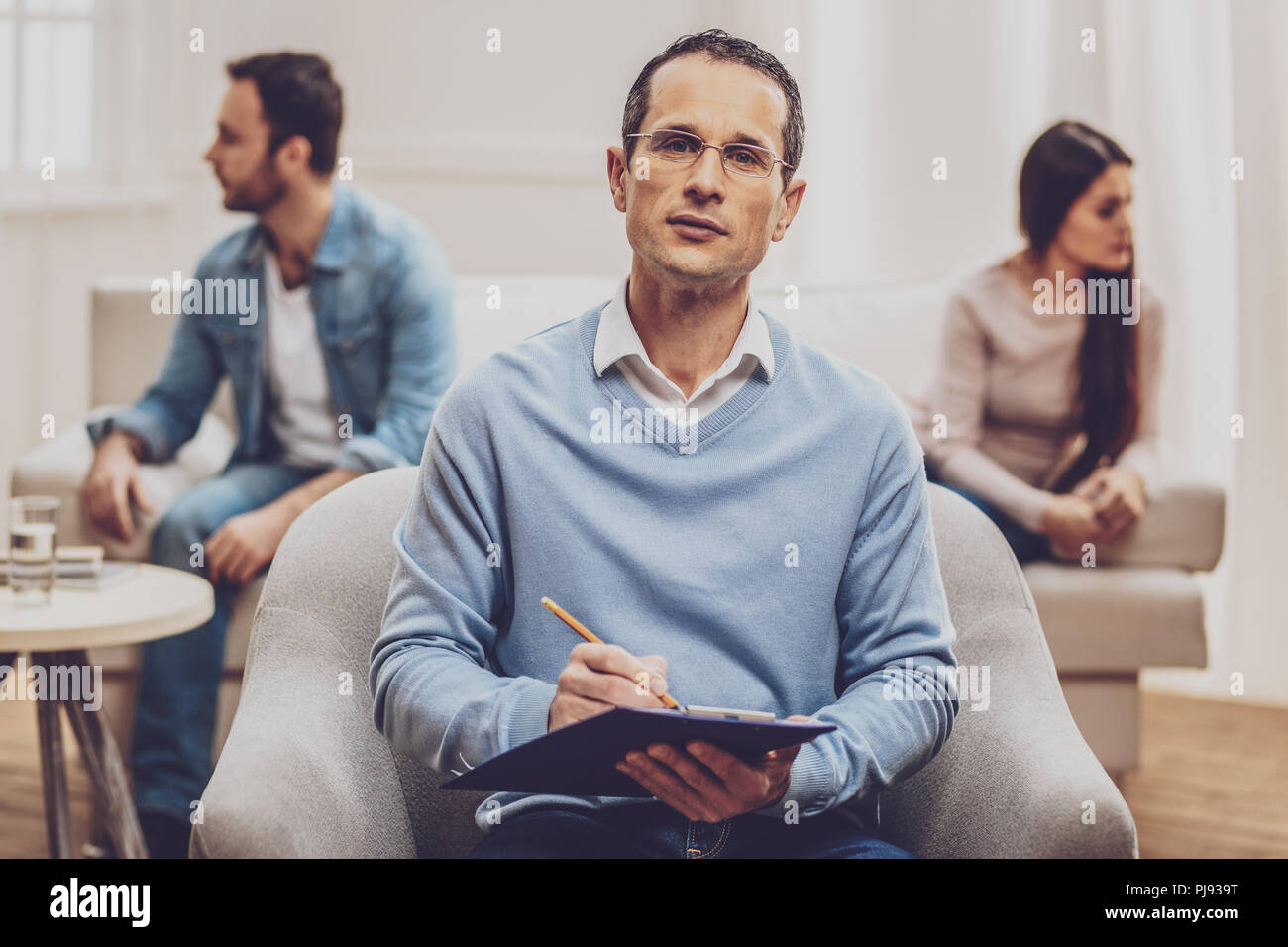 Professional therapist taking notes hi-res stock photography and images ...