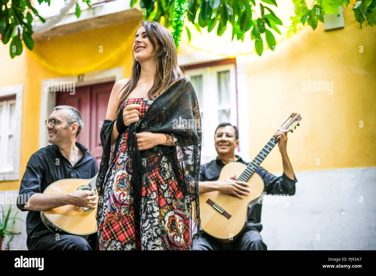Fado band performing traditional portuguese music in the courtyard of ...