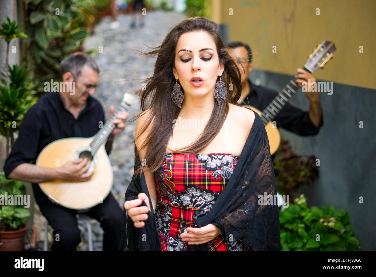 Fado band performing traditional portuguese music on the street of ...