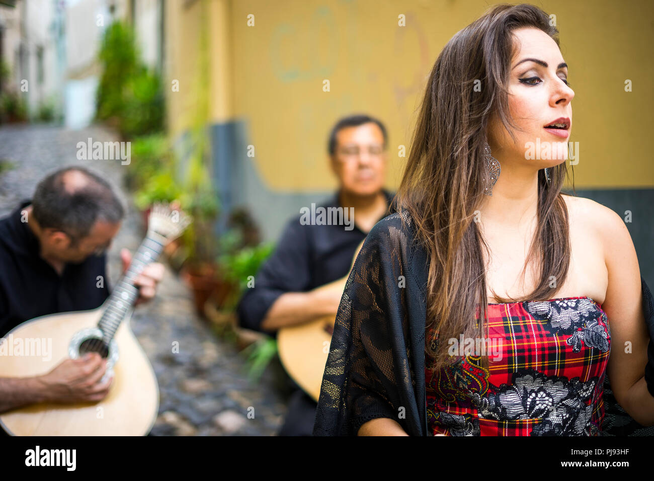 Fado band performing traditional portuguese music on the street of ...