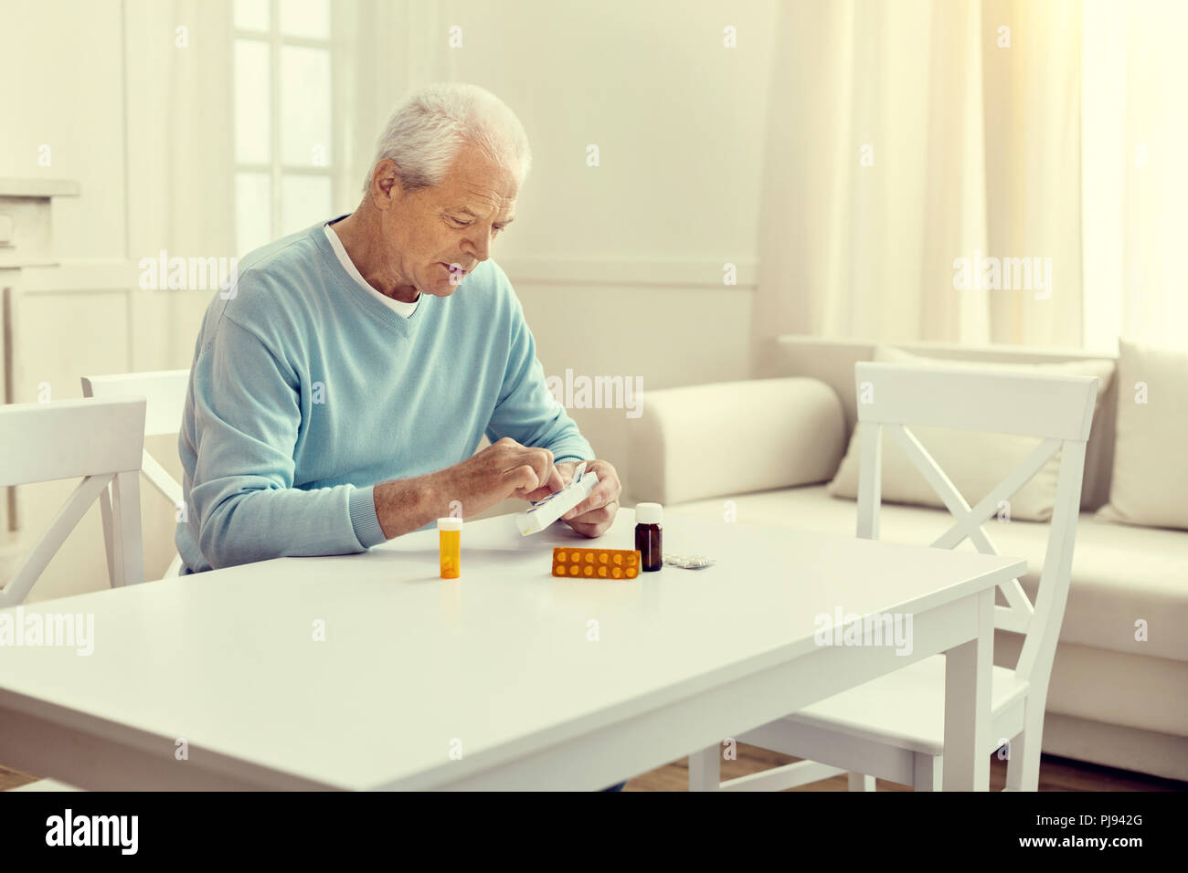 Medication intake hi-res stock photography and images - Alamy