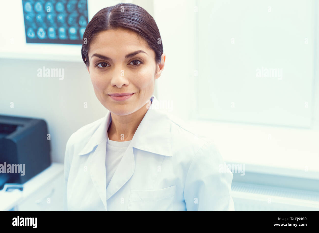 Young medical professional posing at laboratory Stock Photo - Alamy