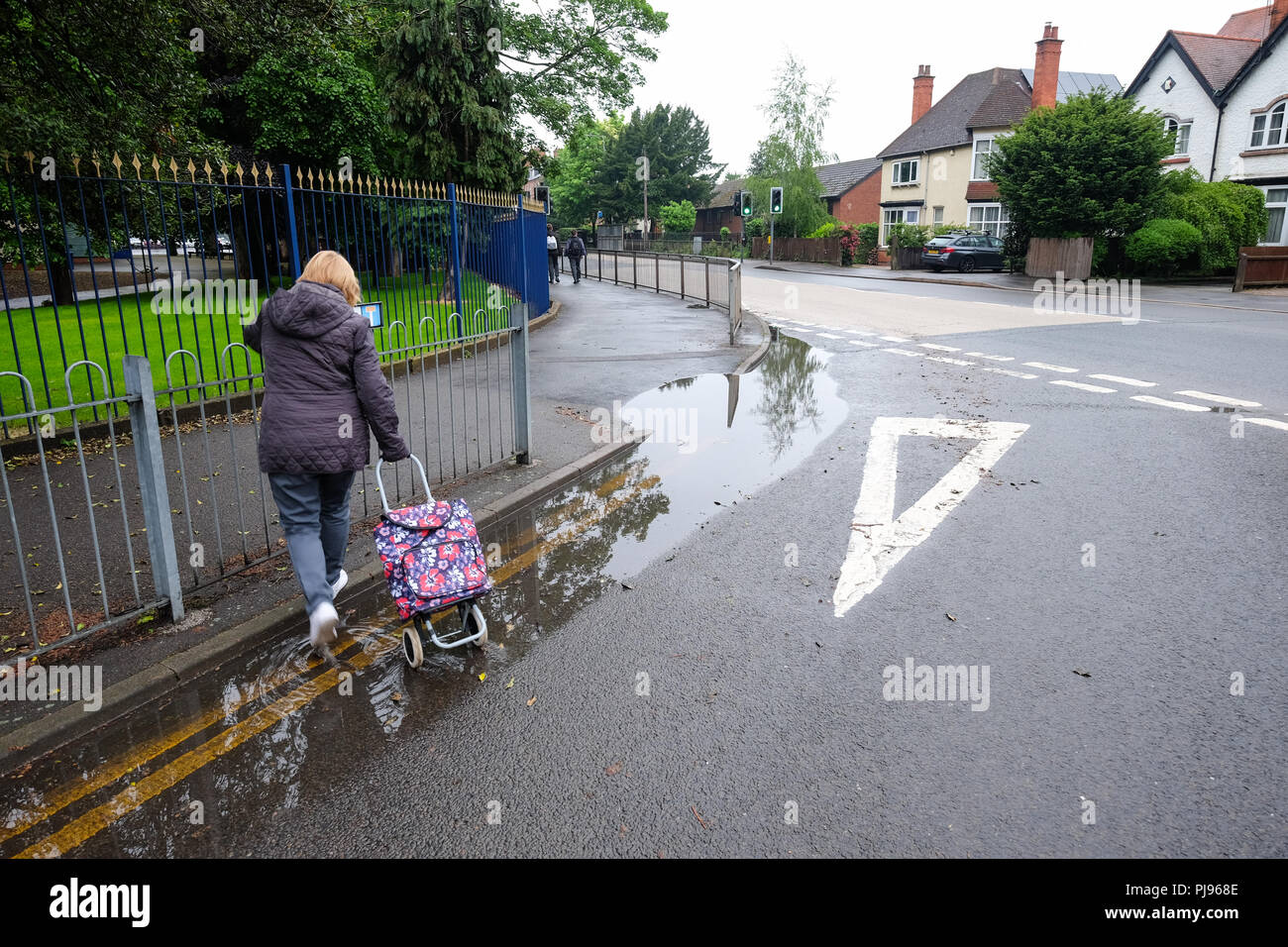 Walking through a puddle hi-res stock photography and images - Alamy