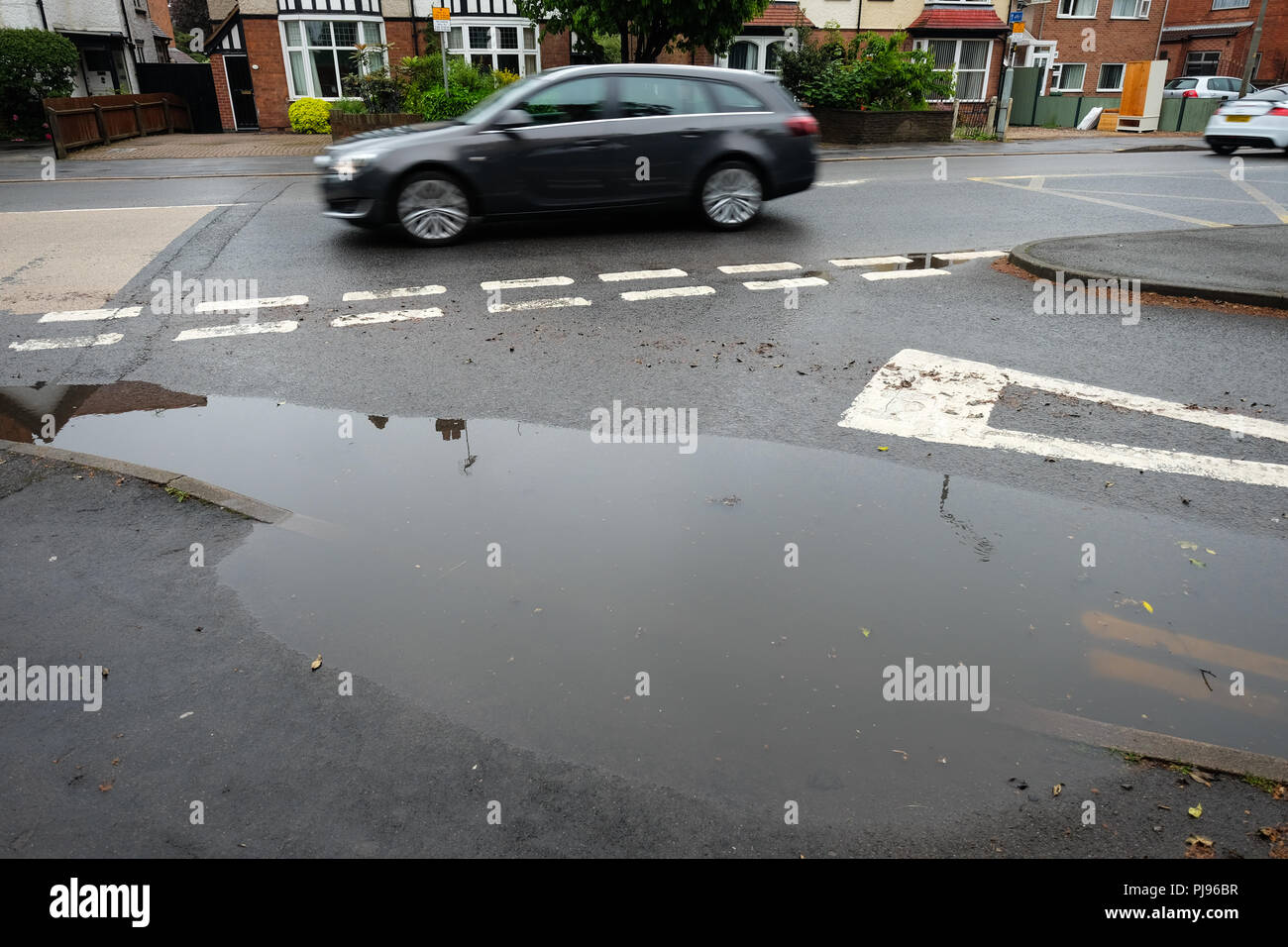 large puddle after heavy rain Stock Photo - Alamy