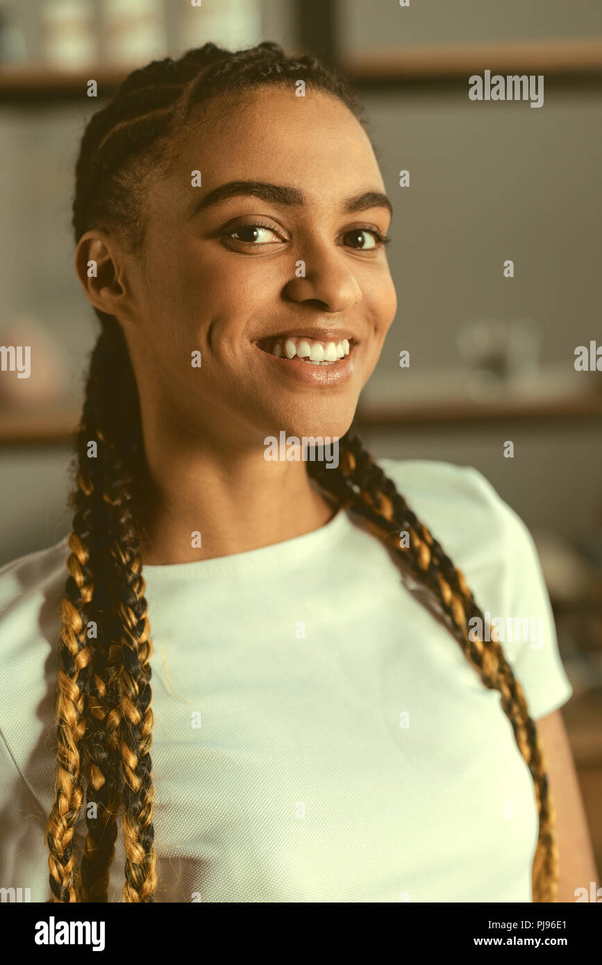 Radiant girl beaming into camera Stock Photo - Alamy