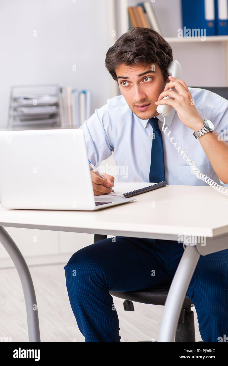 Male receptionist notes hi-res stock photography and images - Alamy