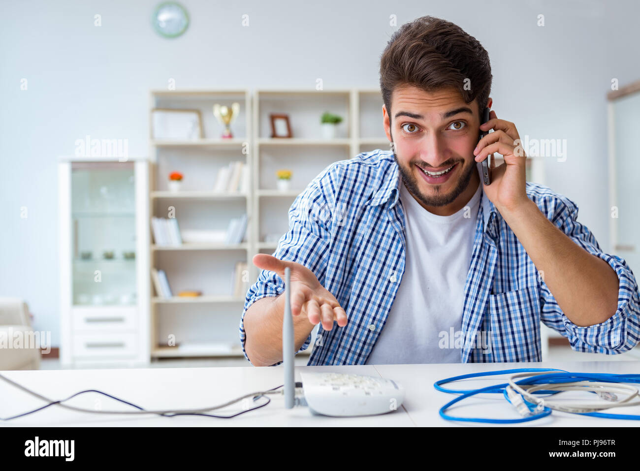 Man enjoying fast internet connection Stock Photo - Alamy
