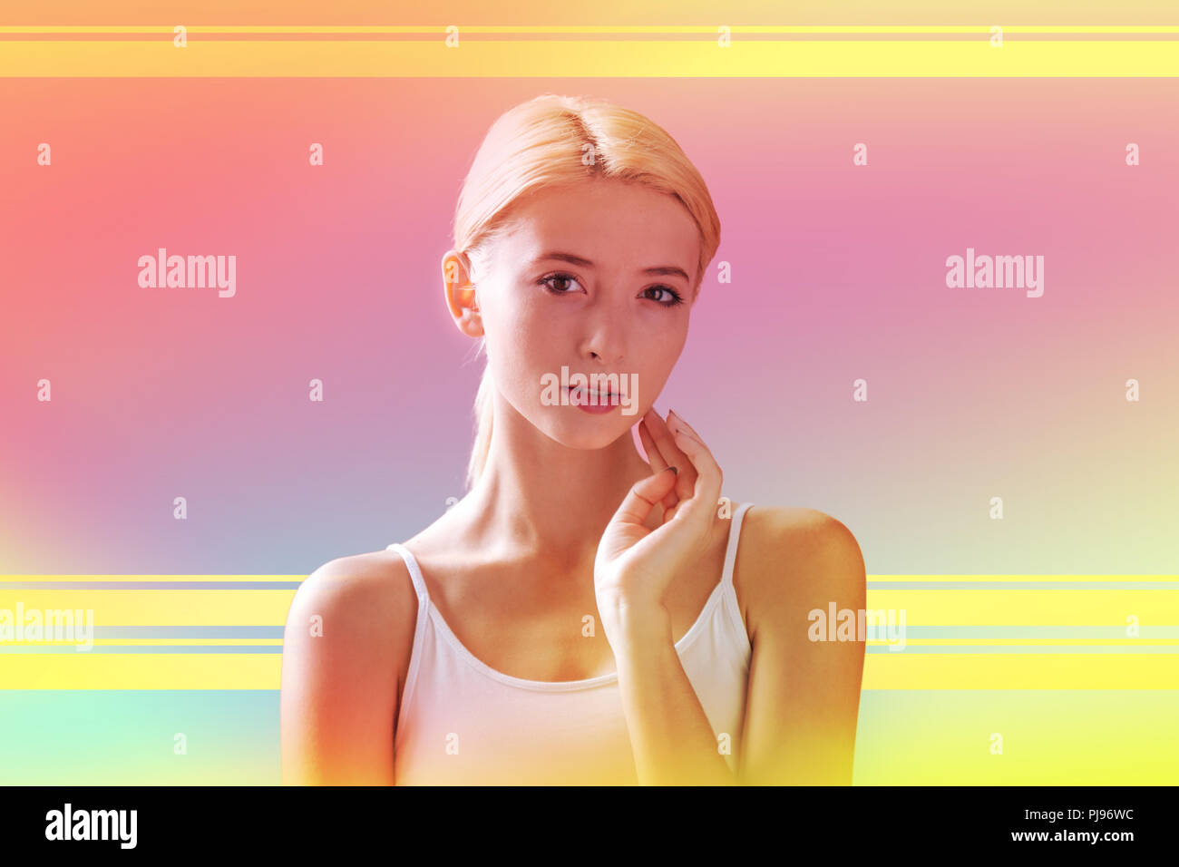 Calm girl feeling interested while looking at the picture Stock Photo ...