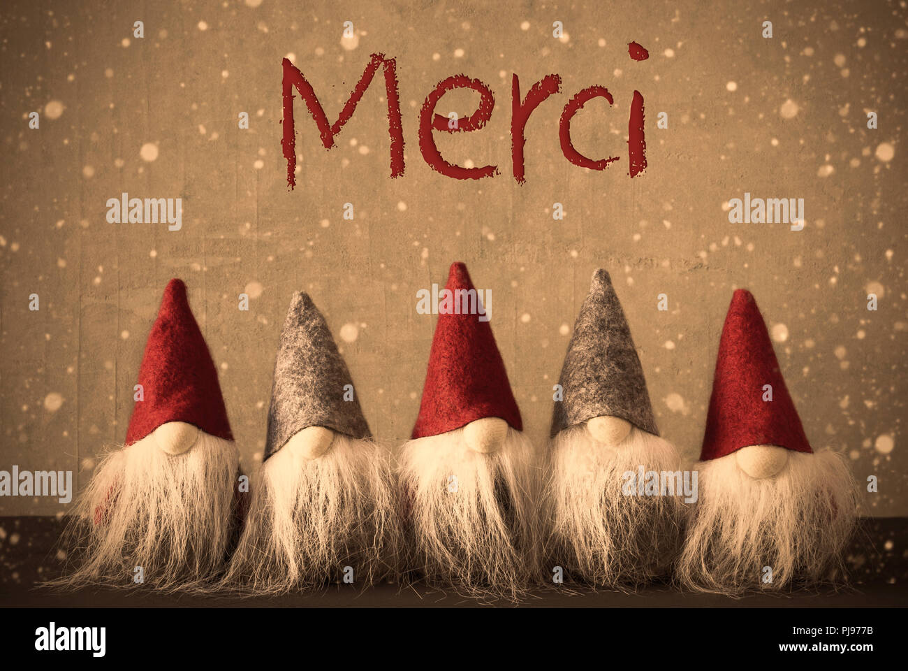 Christmas Gnomes, Snowflakes, Merci Means Thank You Stock Photo - Alamy