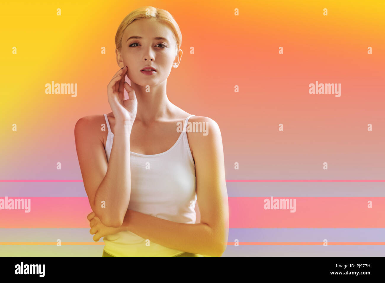 Beautiful young female model looking at you Stock Photo - Alamy