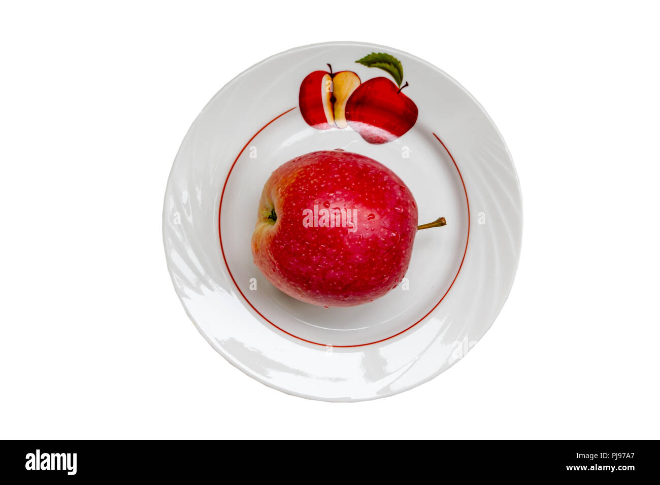 Red apple on plate. Isolated on white background Stock Photo - Alamy