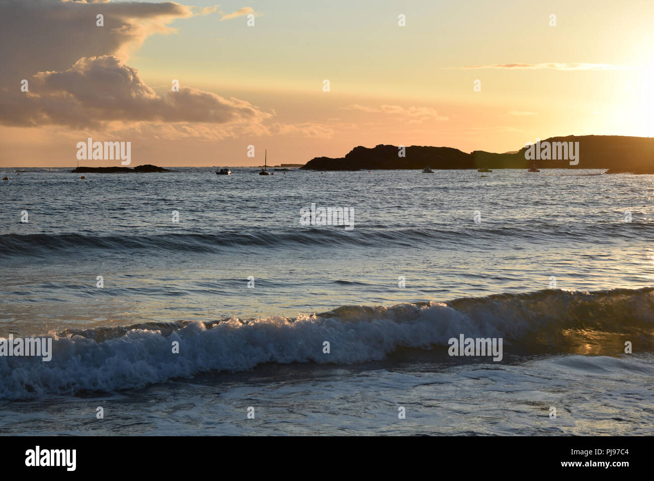 Sunset over Trearddur Bay near Holyhead, Anglesea, North Wales with ...