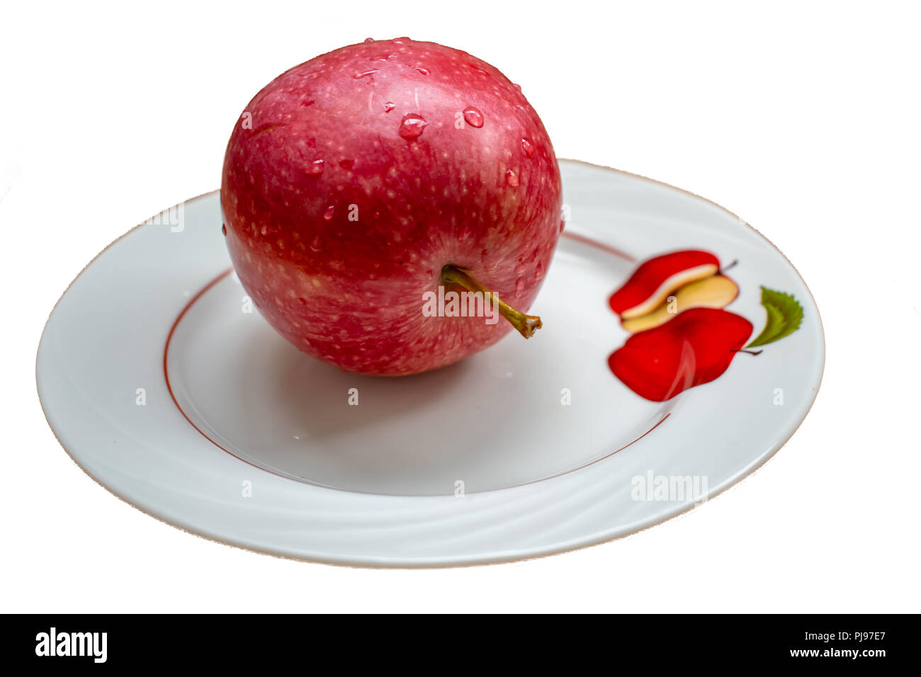 Red apple on plate. Isolated on white background Stock Photo - Alamy