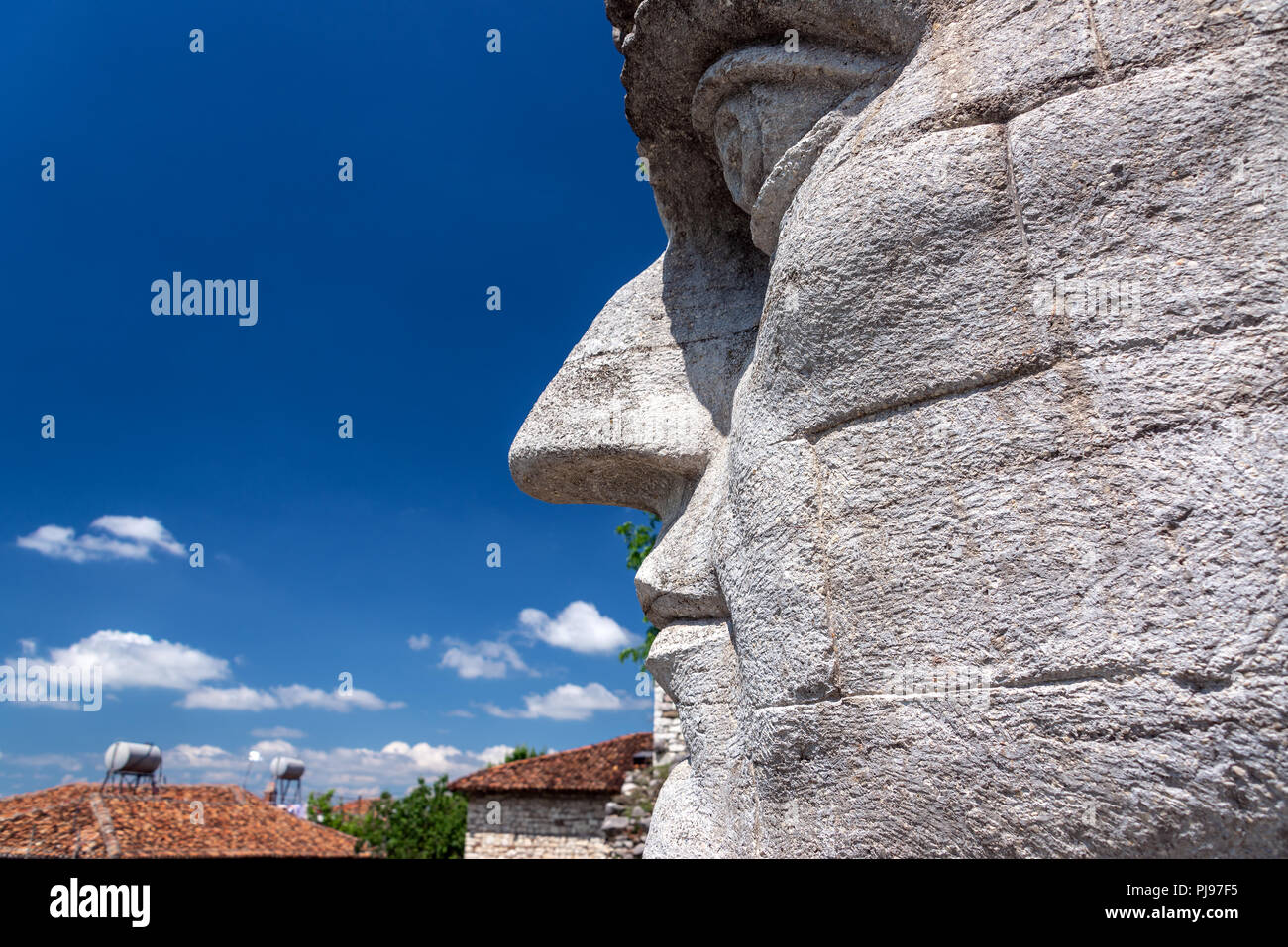 Giant stone head of Constantine the Great at Berat Castle in Berat ...