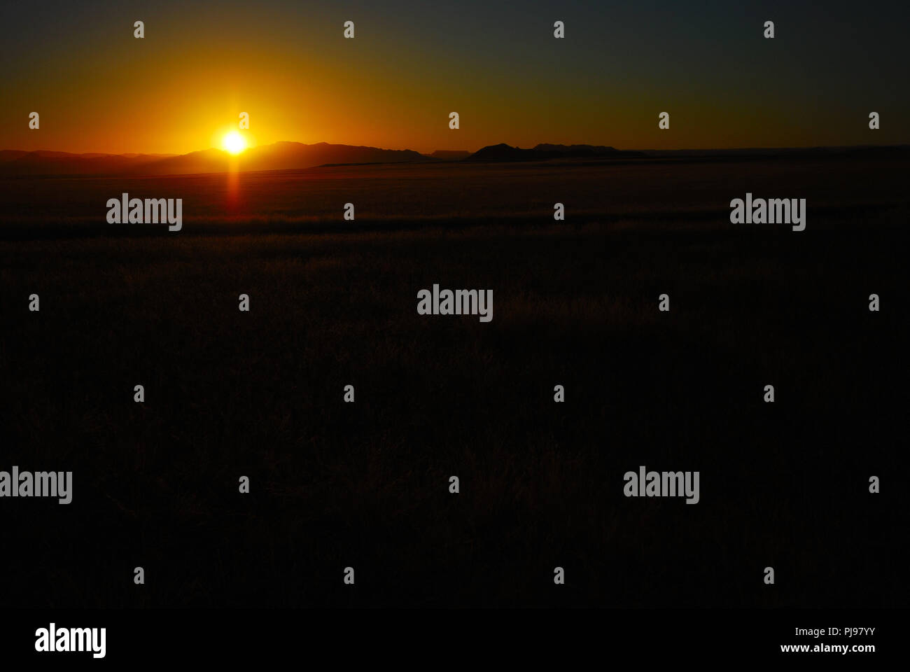 Romantic sunset in Namib desert, Namibia Stock Photo - Alamy