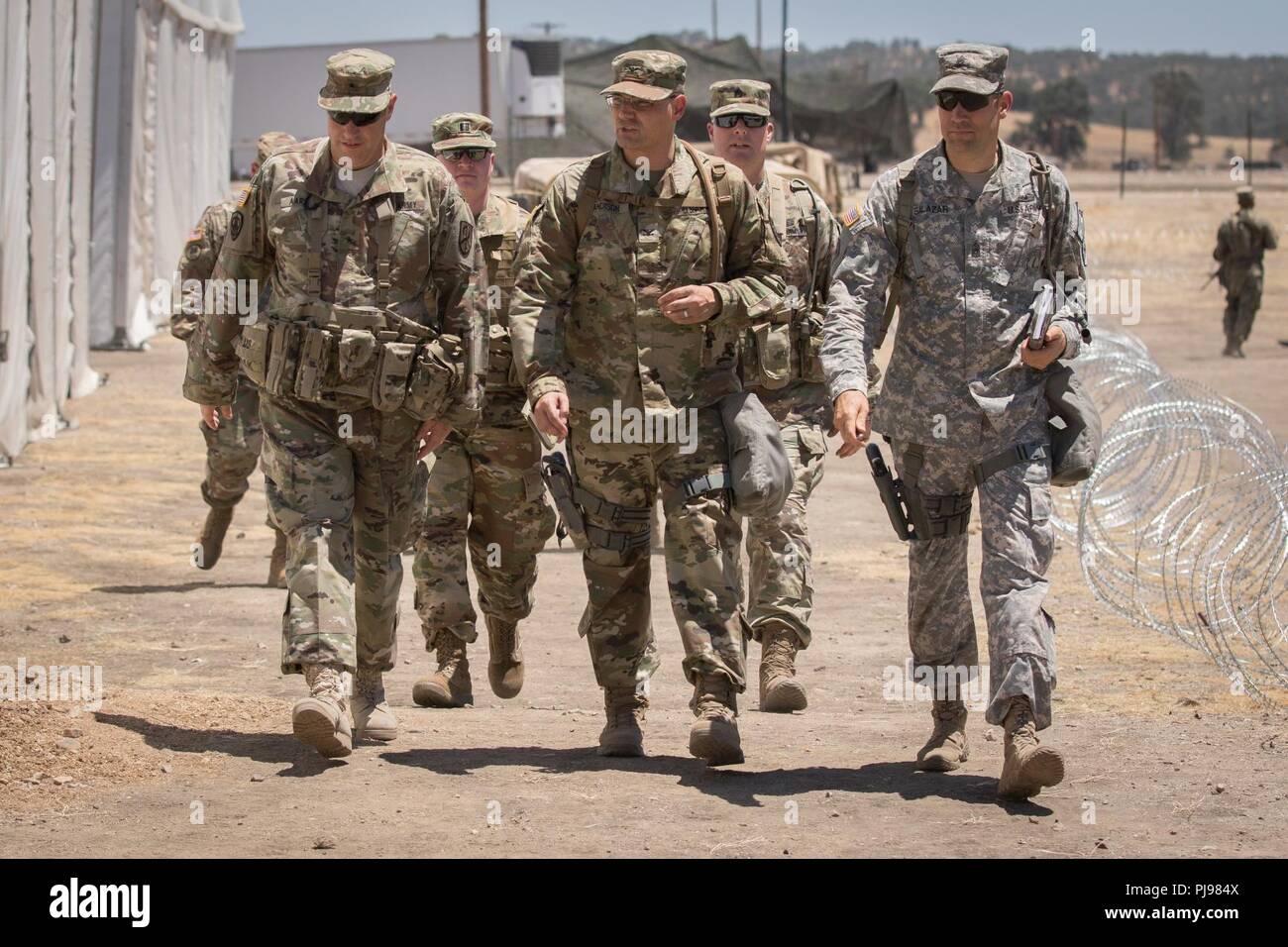 Army Reserve Brig. Gen. John W. Aarsen (left), commander of the 451st ...