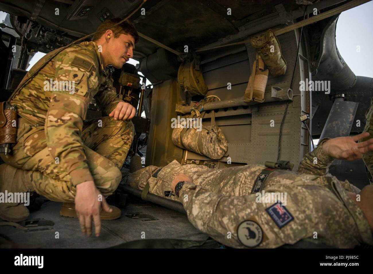 U.S. Army Spc. Wilson, with Task Force Liberty, secures a simulated ...