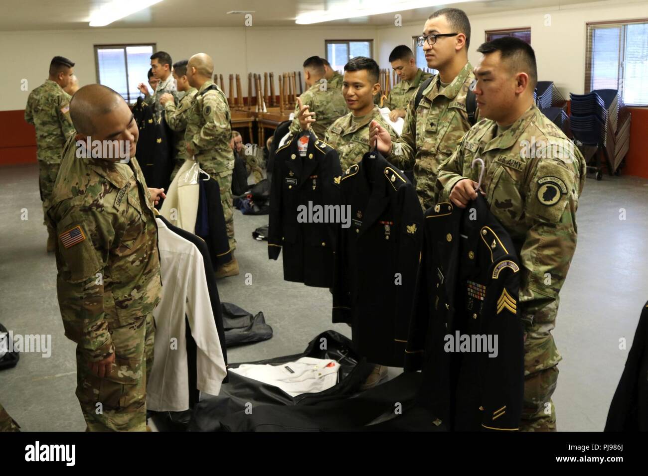 The 111th Army Band conducts a uniform inspection prior to an evening ...