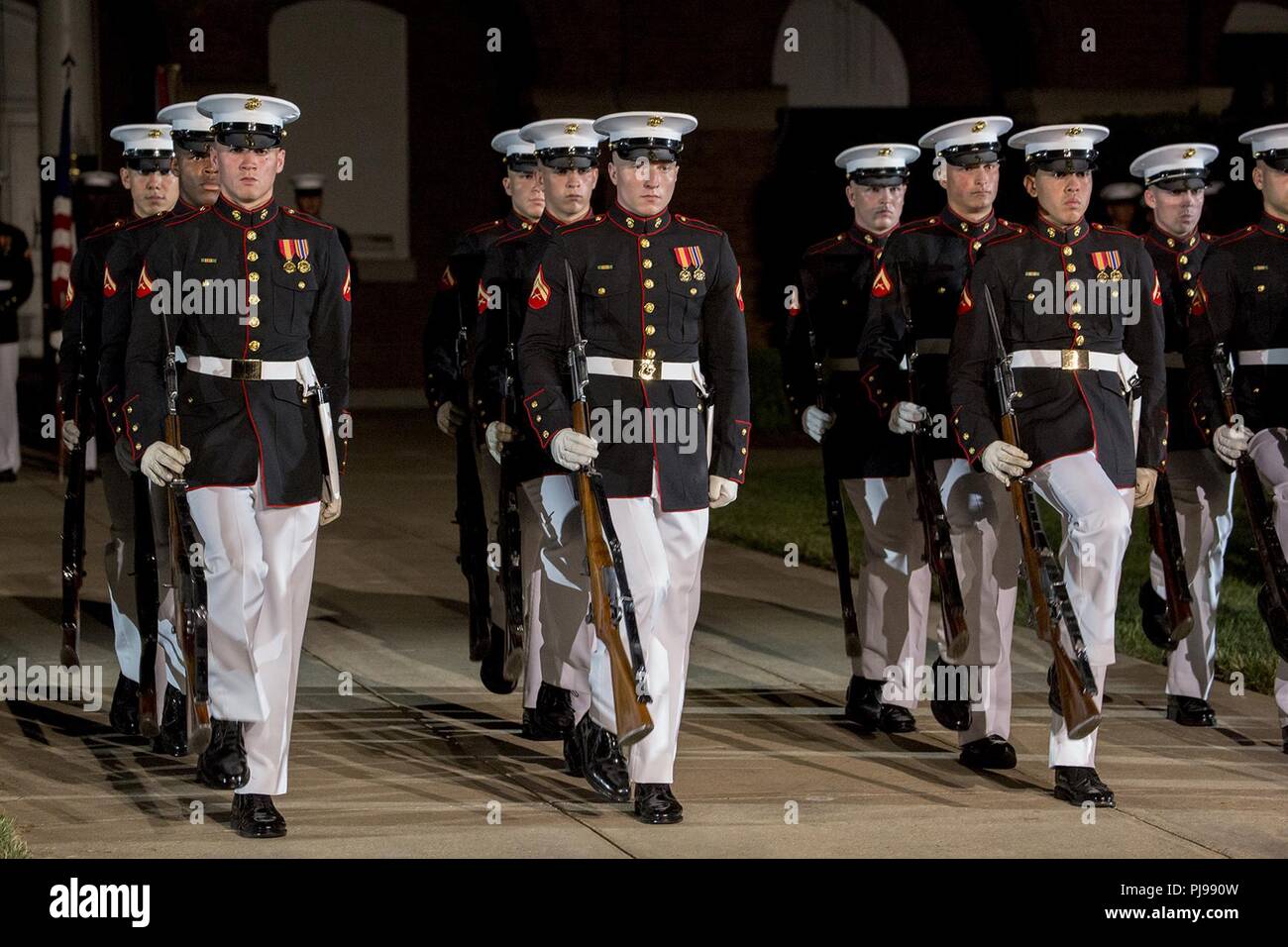 Marines with U.S. Marine Corps Silent Drill Platoon march on the parade ...