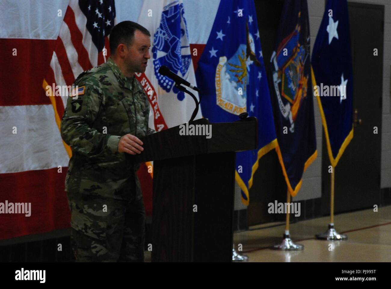 New York National Guard Maj. Brendan Rowe speaks during the 100th ...