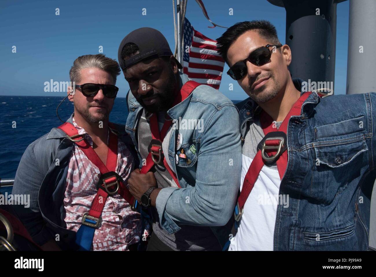 PACIFIC OCEAN (July 6, 2018) From the left, actors Zachary Knighton ...